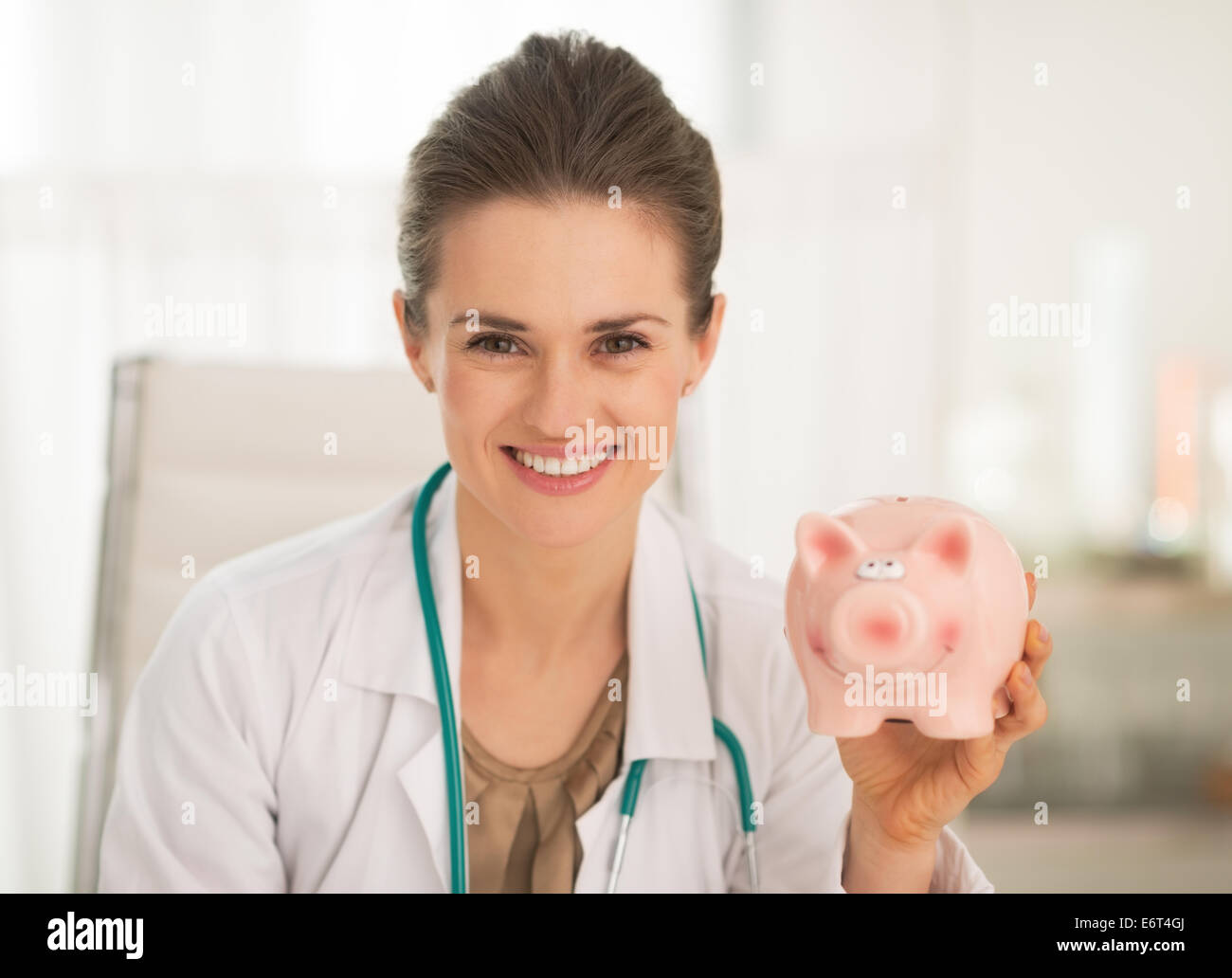 Doctor Woman Piggy Bank High Resolution Stock Photography and Images ...