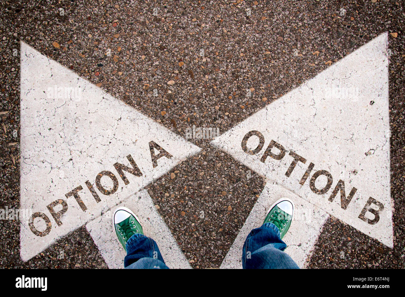 Options a and b dilemma concept with man legs from above standing on ...