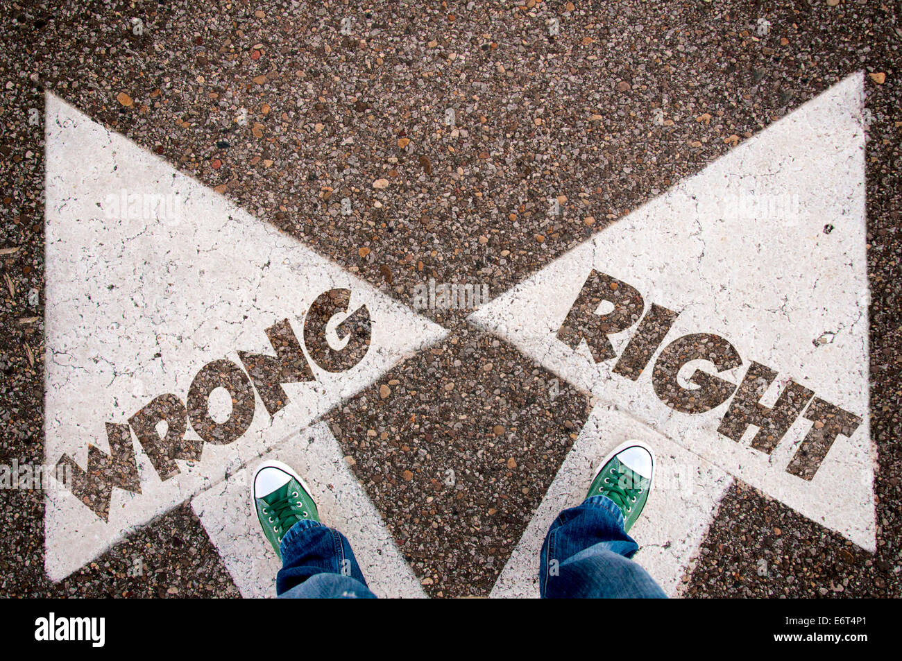 Wrong and right dilemma concept with man legs from above standing on ...
