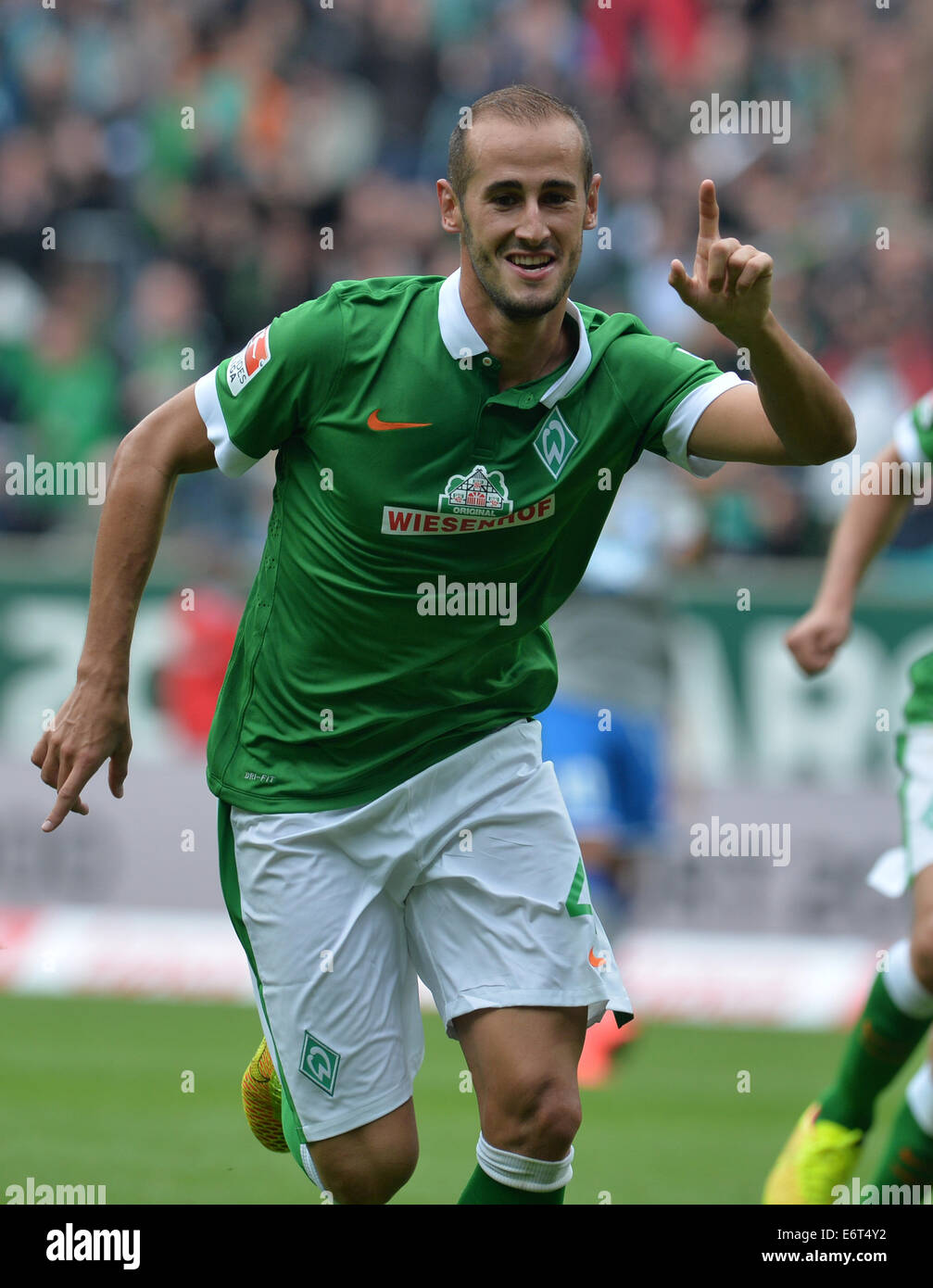 Bremen, Germany. 30th Aug, 2014. Bremen's Alejandro Galvez (L ...