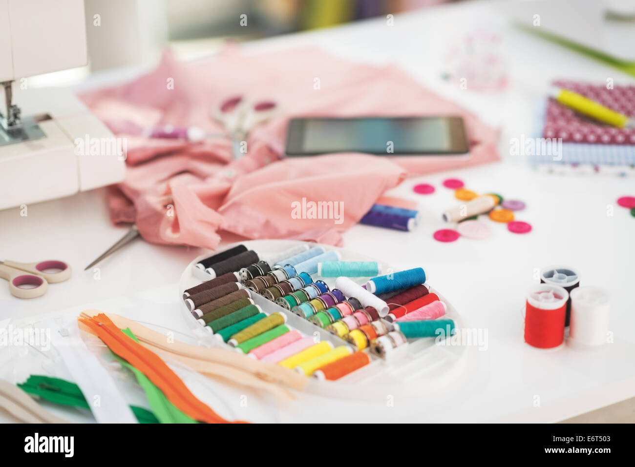 Closeup on tailor work desk Stock Photo - Alamy