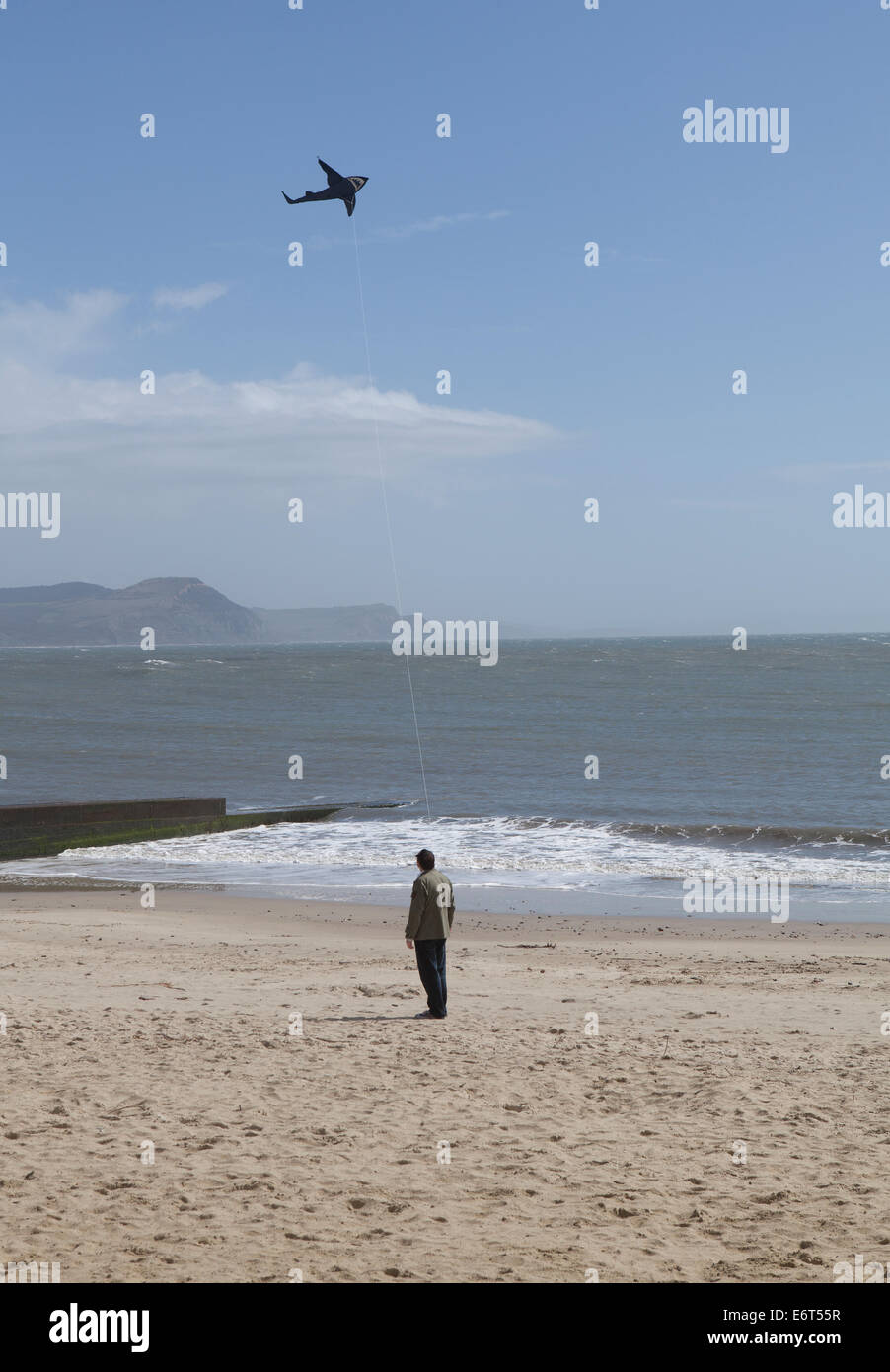 Man Flying a Kite Stock Photo - Alamy