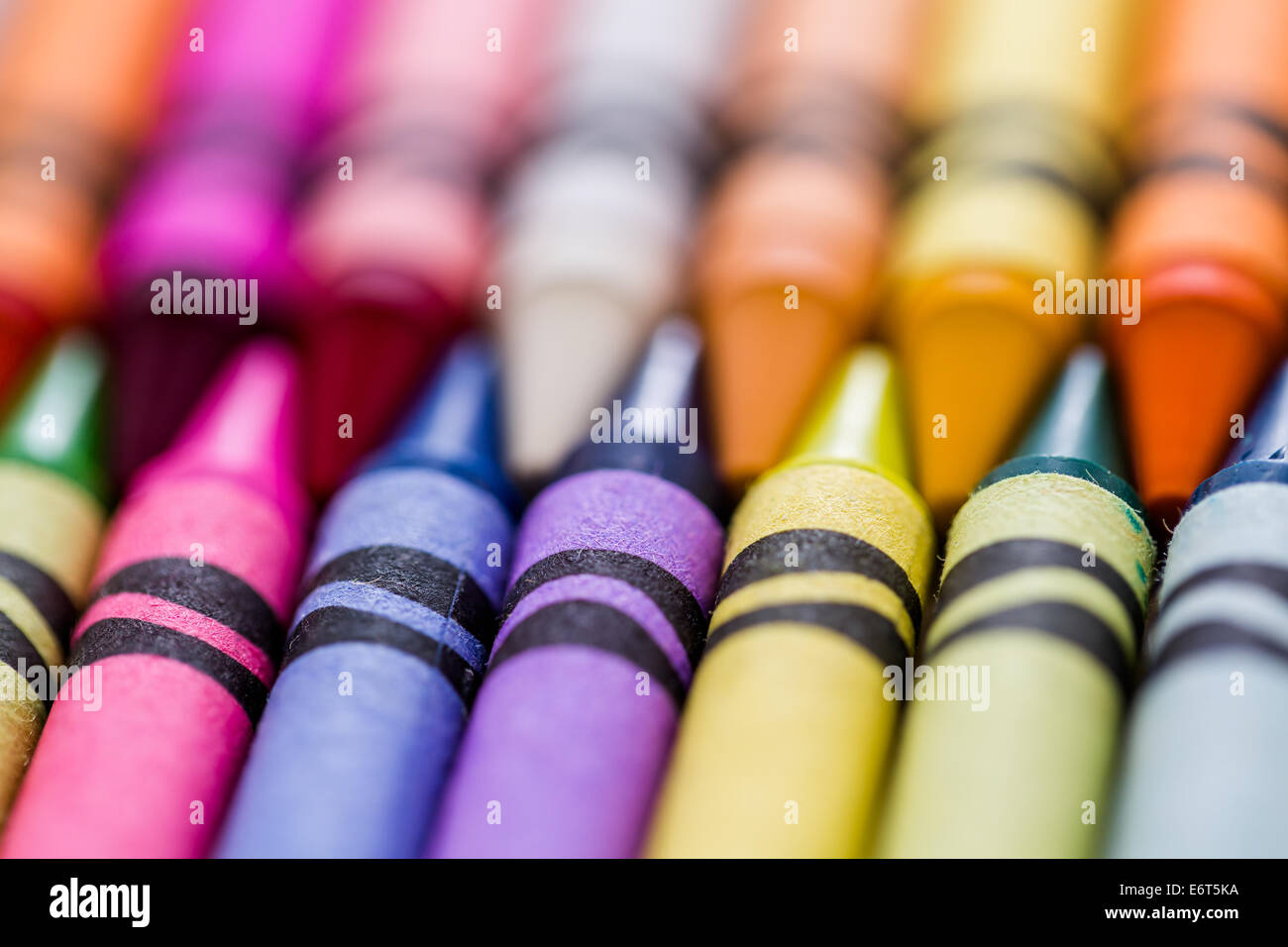 Multicolored crayons on a white background Stock Photo - Alamy