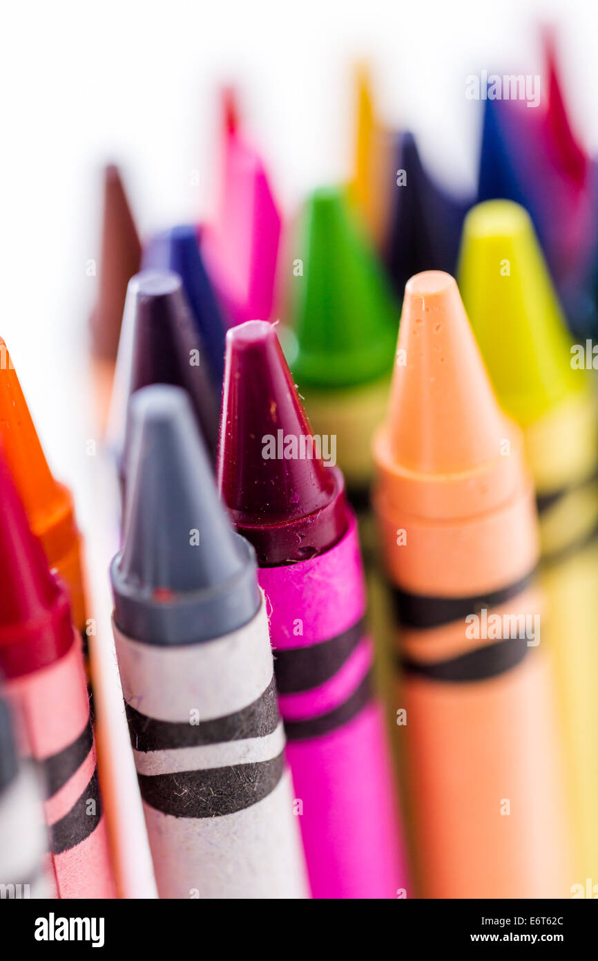Multicolored crayons on a white background Stock Photo - Alamy