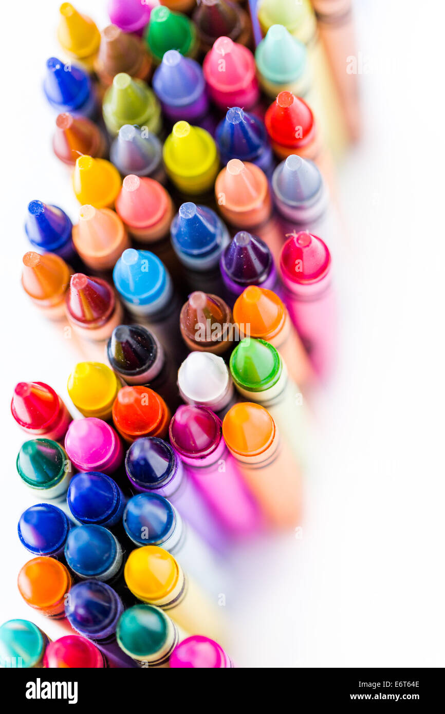 Multicolored crayons on a white background Stock Photo - Alamy
