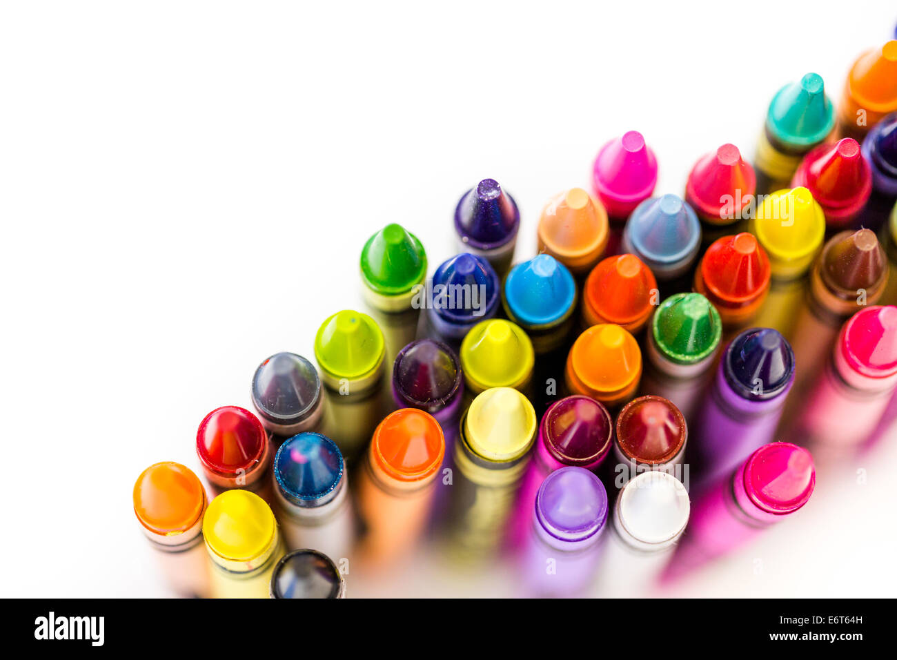 Multicolored crayons on a white background Stock Photo - Alamy