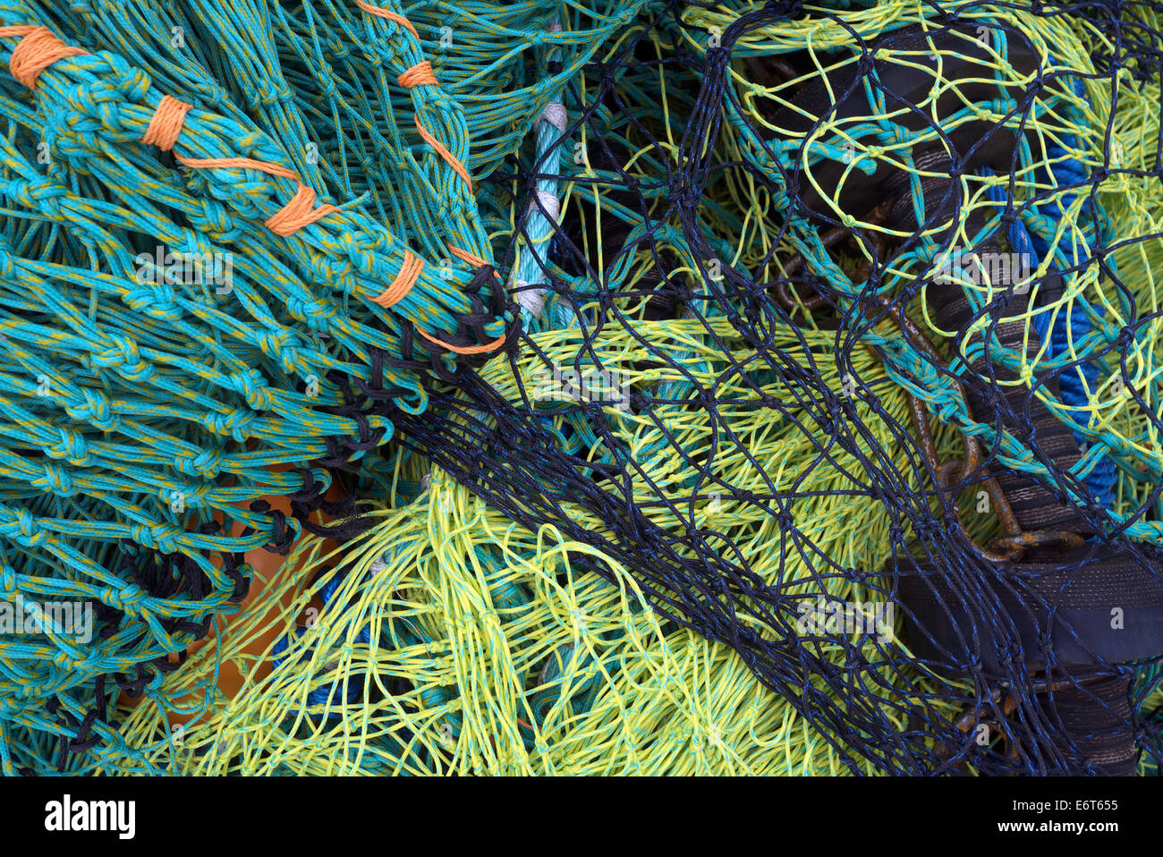 Fishing boat still life, showing nets, buoys and various trawler and ...