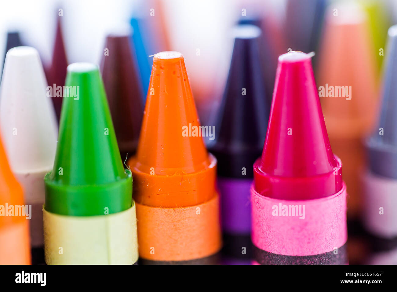 Multicolored crayons on a white background Stock Photo - Alamy