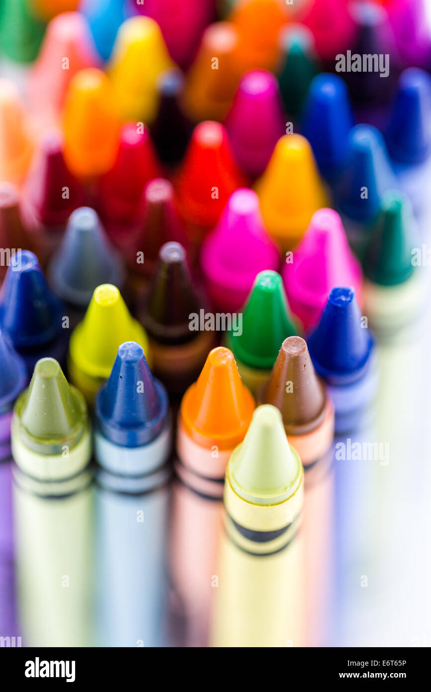 Multicolored crayons on a white background Stock Photo - Alamy