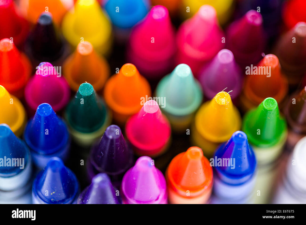 Multicolored crayons on a white background Stock Photo - Alamy