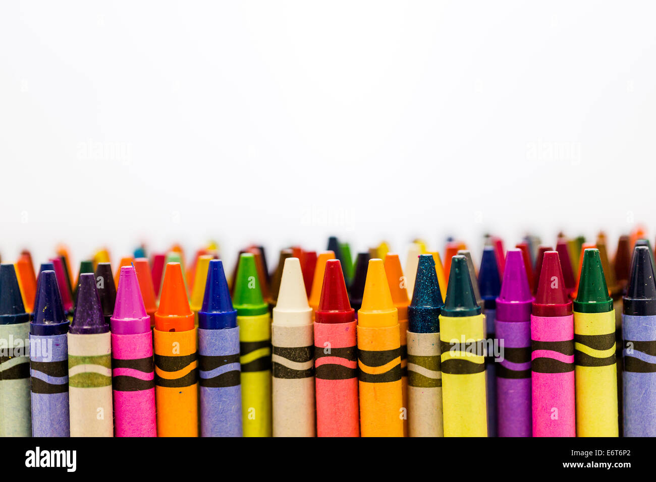 Multicolored crayons on a white background Stock Photo - Alamy