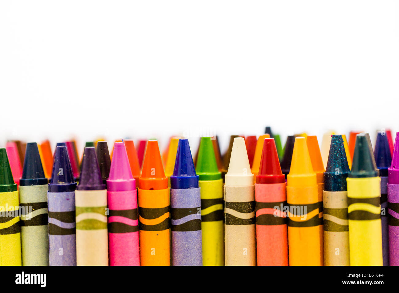 Multicolored crayons on a white background Stock Photo - Alamy
