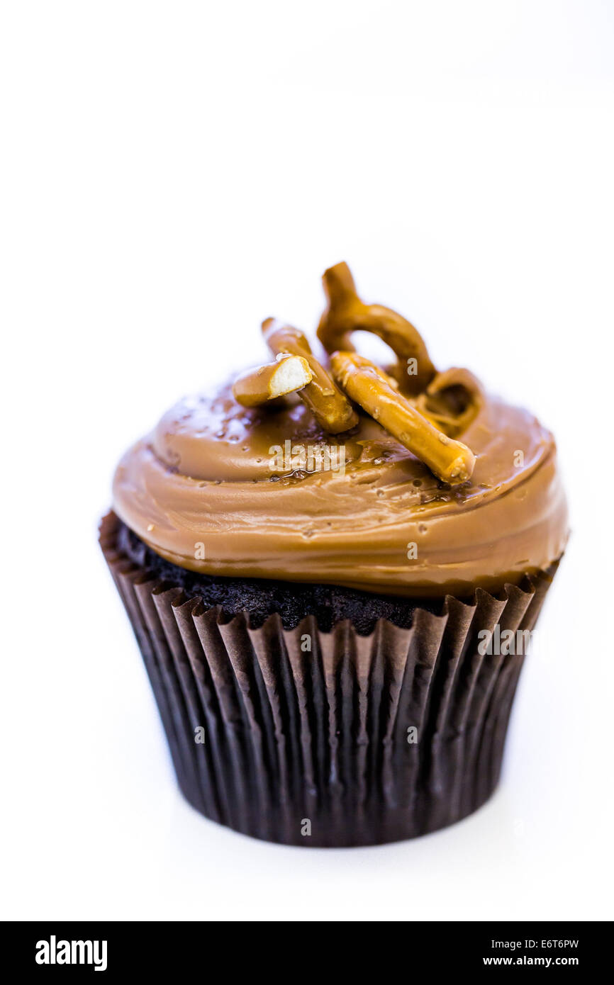 Chocolate cupcake topped cream Cut Out Stock Images & Pictures - Alamy