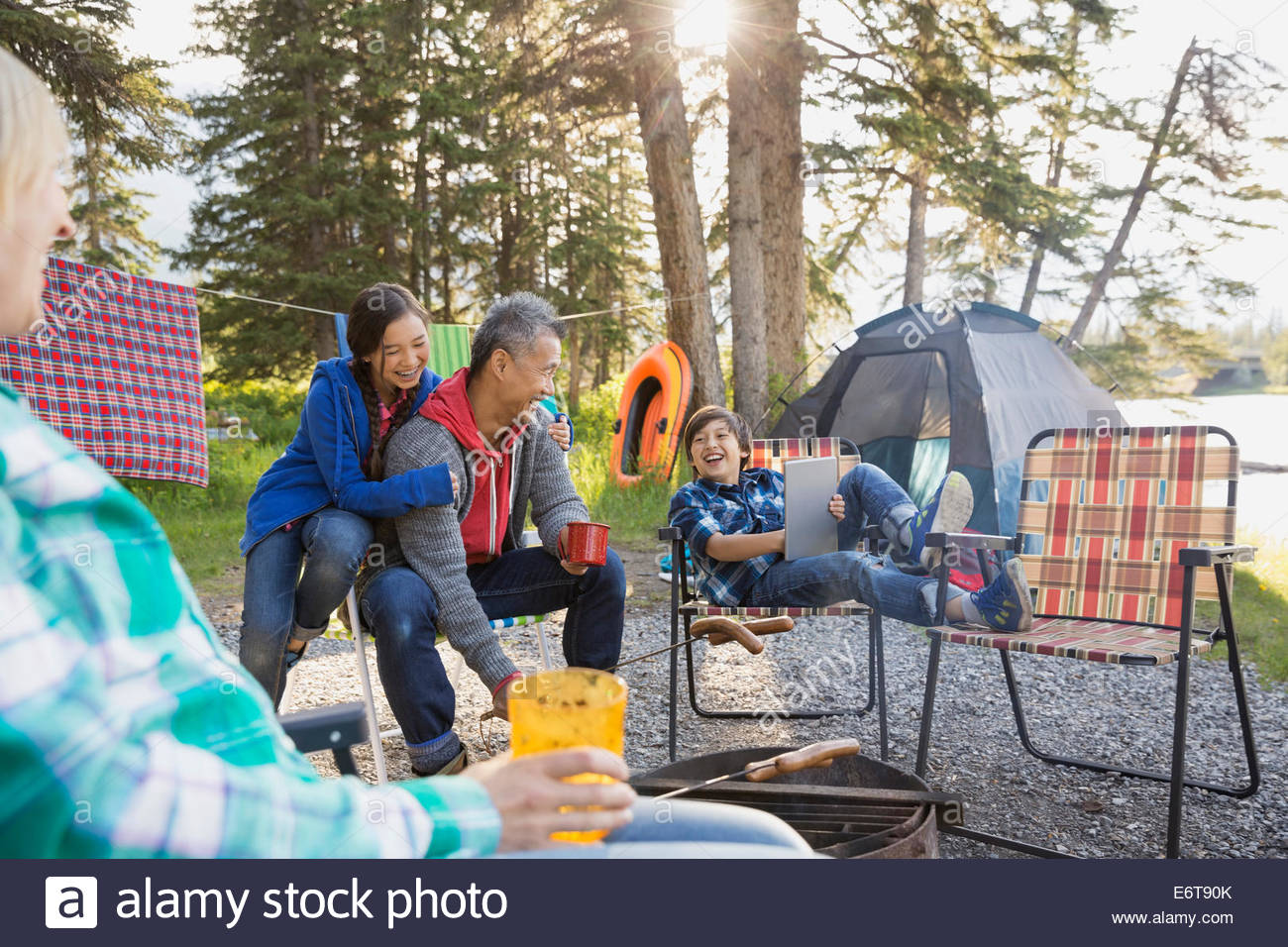 People Around Campfire Stock Photos & People Around Campfire Stock ...