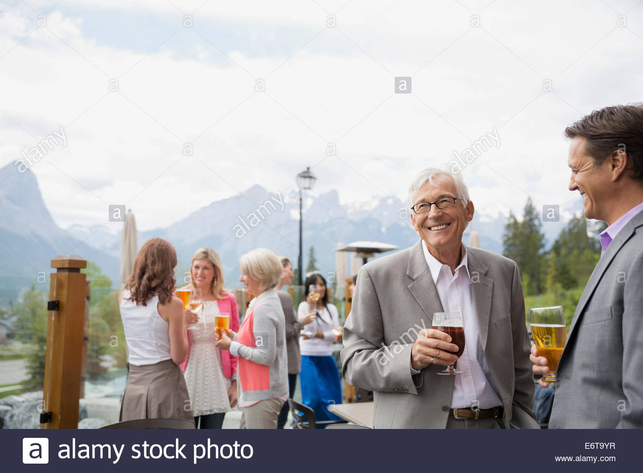 Business people talking together outdoors hi-res stock photography and ...