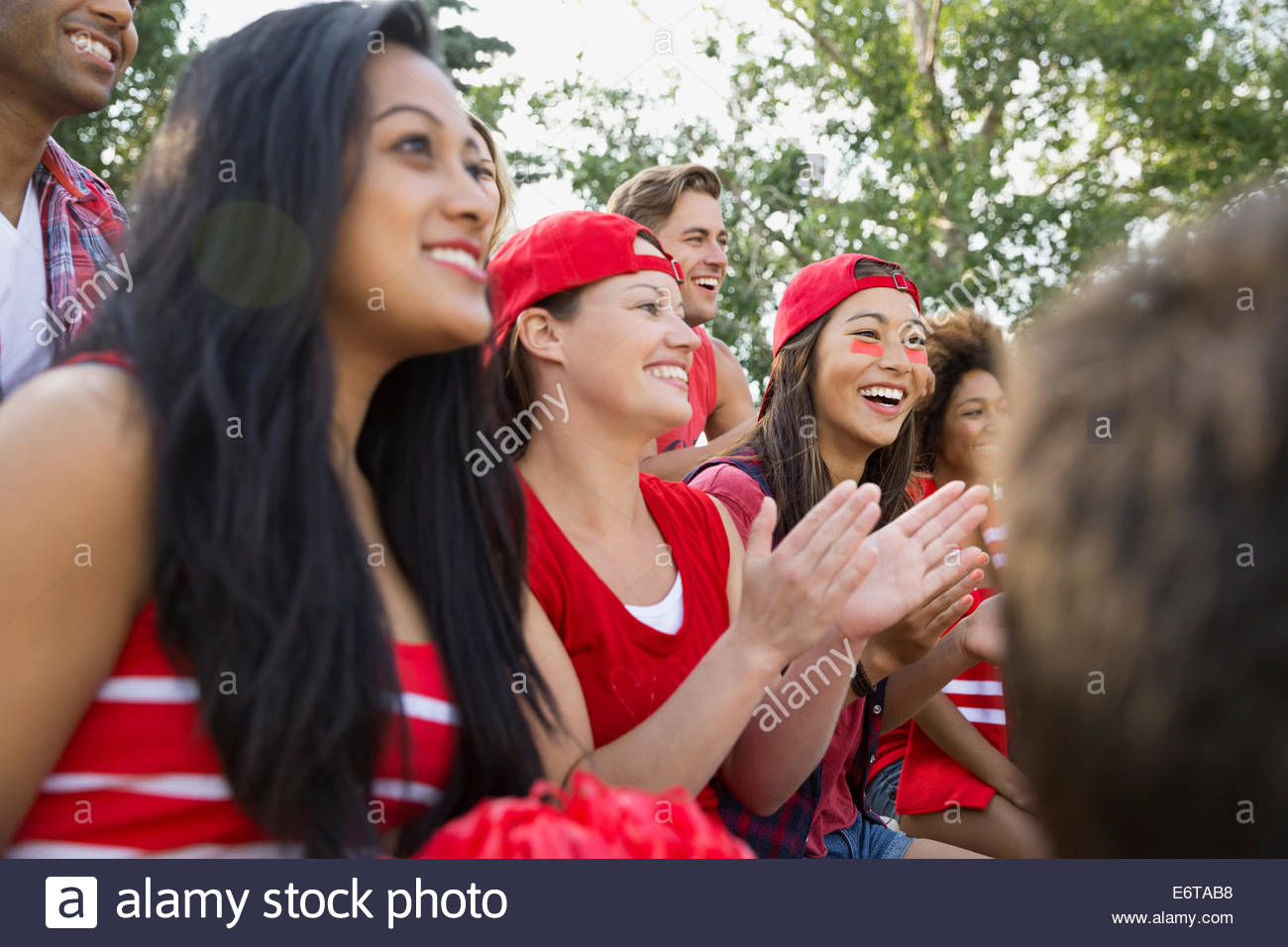 Clapping applauding supporting cheering hi-res stock photography and ...