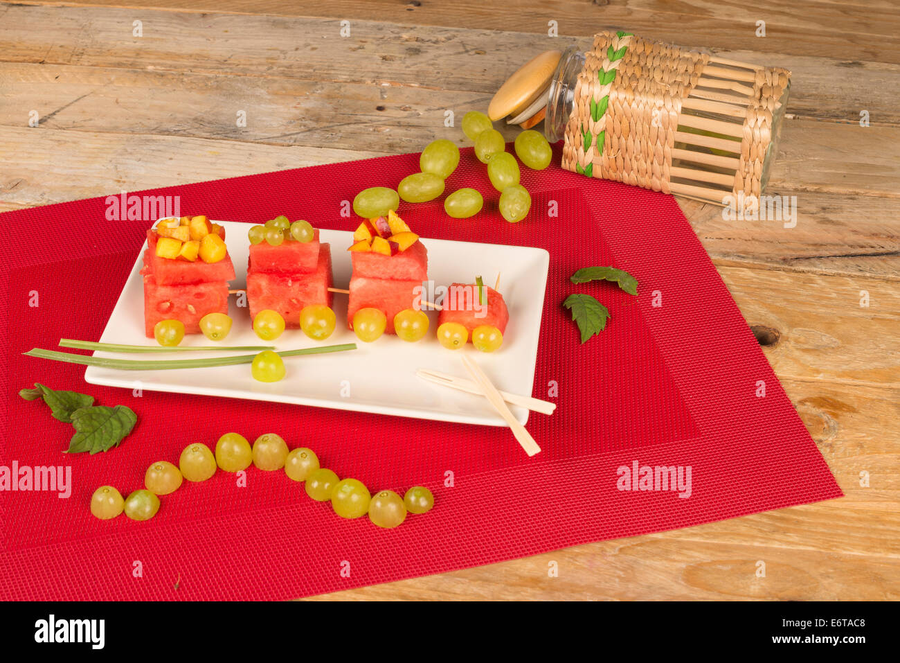 Fruity watermelon train, a creative dessert for kids Stock Photo - Alamy