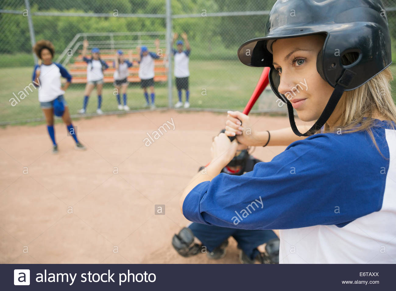 Baseball player ready for ball at home plate Stock Photo - Alamy
