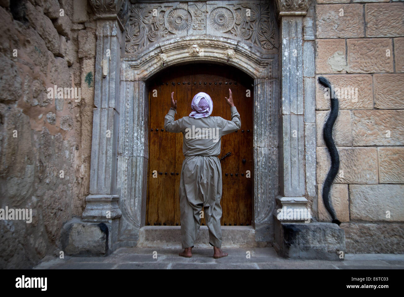 Yazidi man in the temple hi-res stock photography and images - Alamy