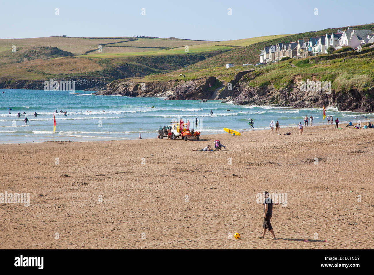 The beach and sea at Polzeath seaside resort, Cornwall, England, UK ...
