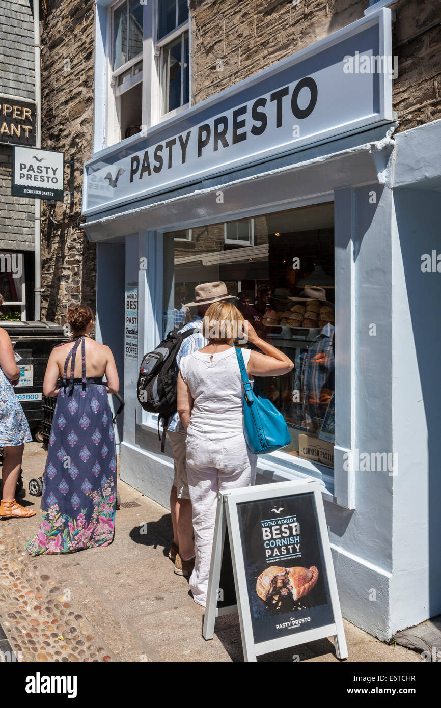 Tourists outside Cornish pasty shops in Padstow, Cornwall, England, UK ...