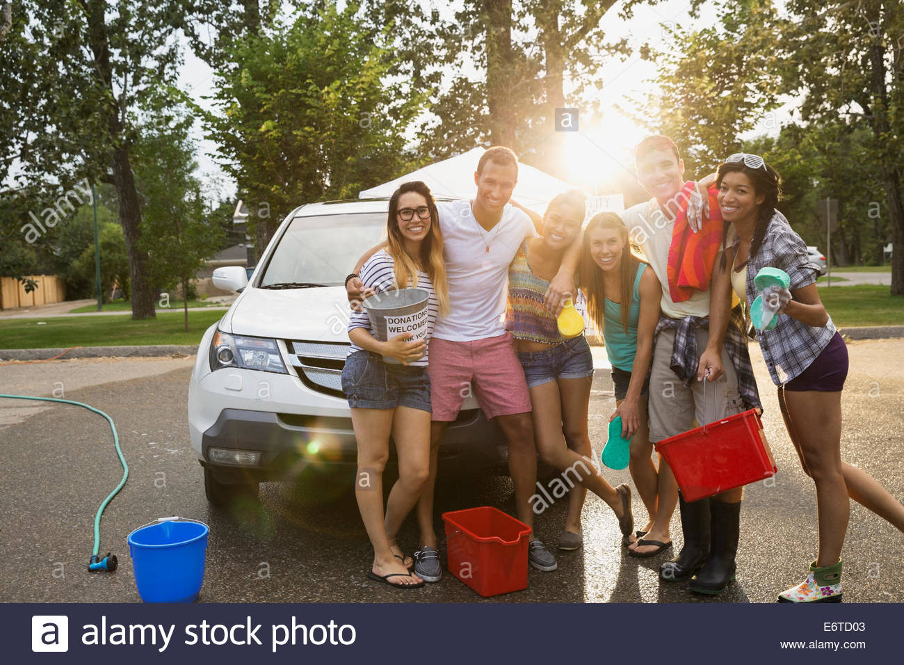 Happy man washing car hi-res stock photography and images - Alamy