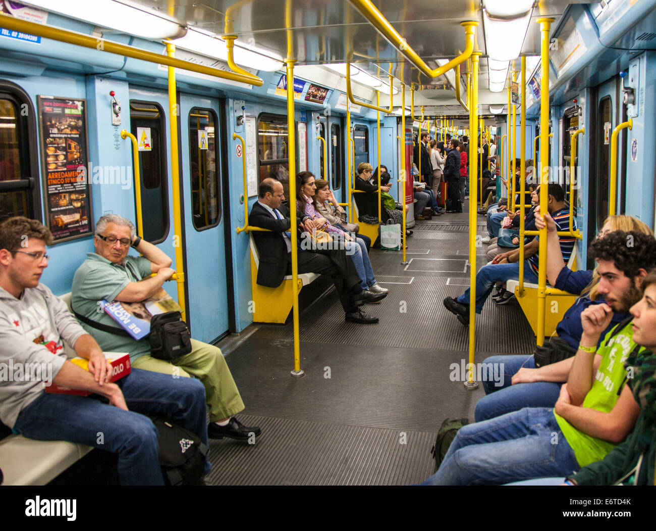 Passengers on Milan's underground metro train system Stock Photo - Alamy