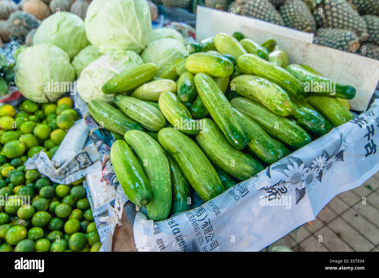 Cucumber at wet market Stock Photo - Alamy
