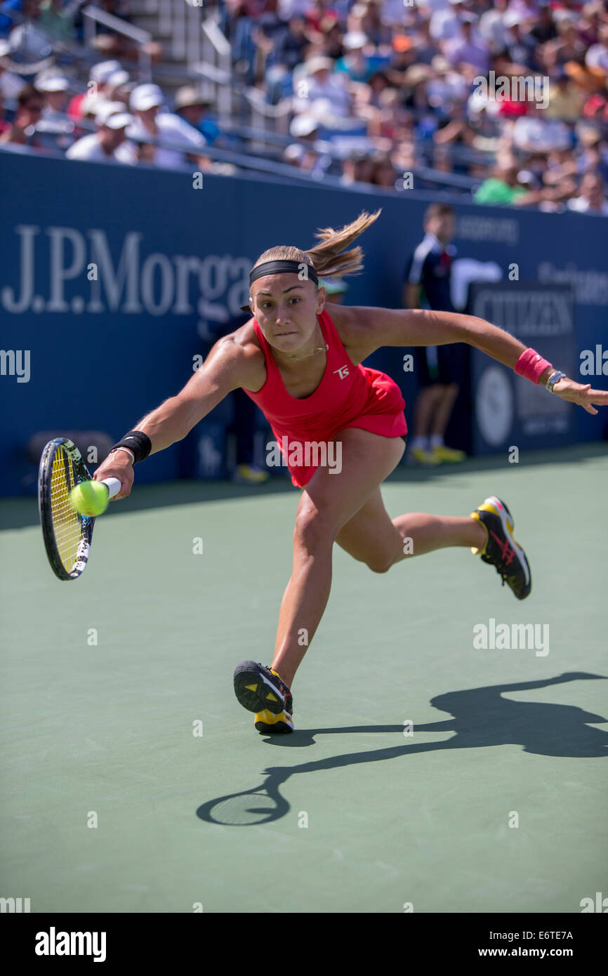 Flushing Meadows, NY, USA. 30th Aug, 2014. Aleksandra Krunic (SRB) in action against Petra ...