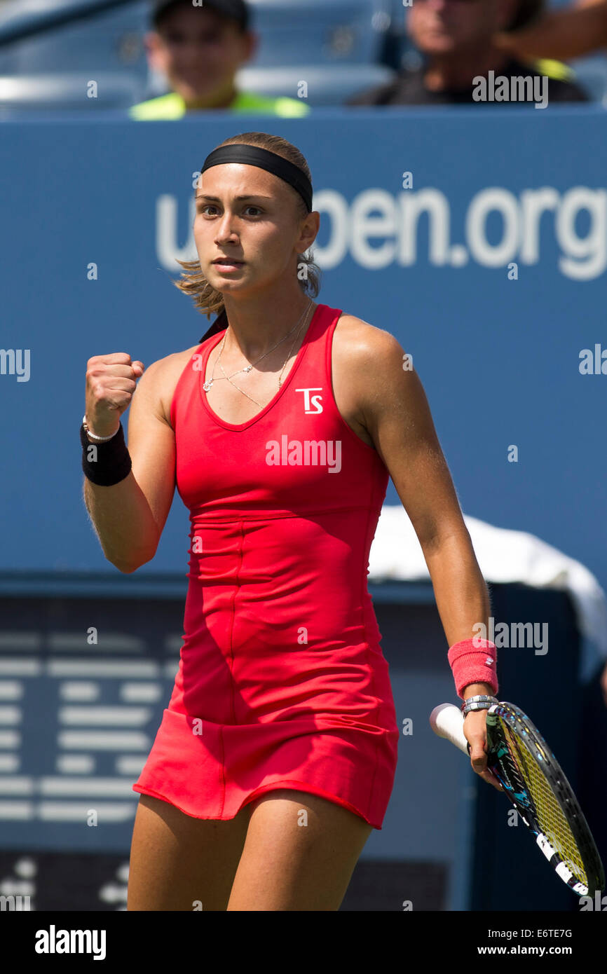 Flushing Meadows, NY, USA. 30th Aug, 2014. Aleksandra Krunic (SRB) in action against Petra ...