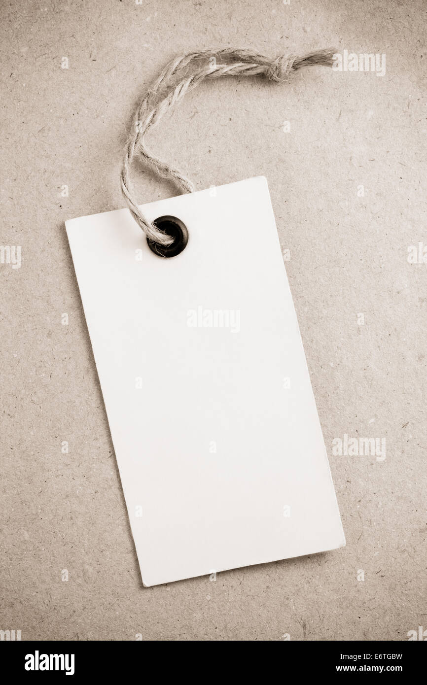 price tag label at paper textured background Stock Photo - Alamy