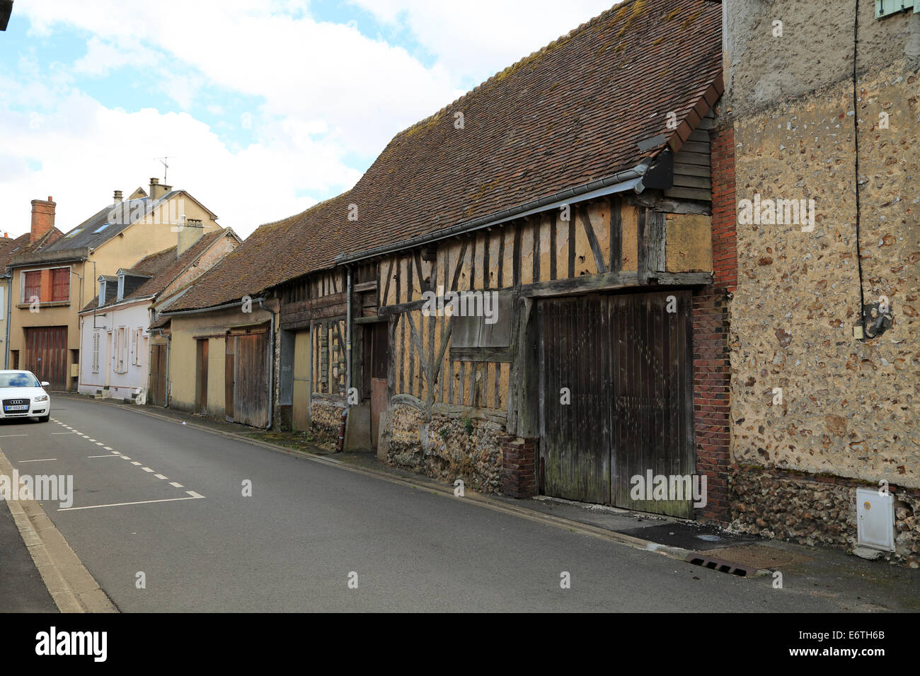 Ancient half timbered building in street, Rue des Lavoirs, Illiers ...