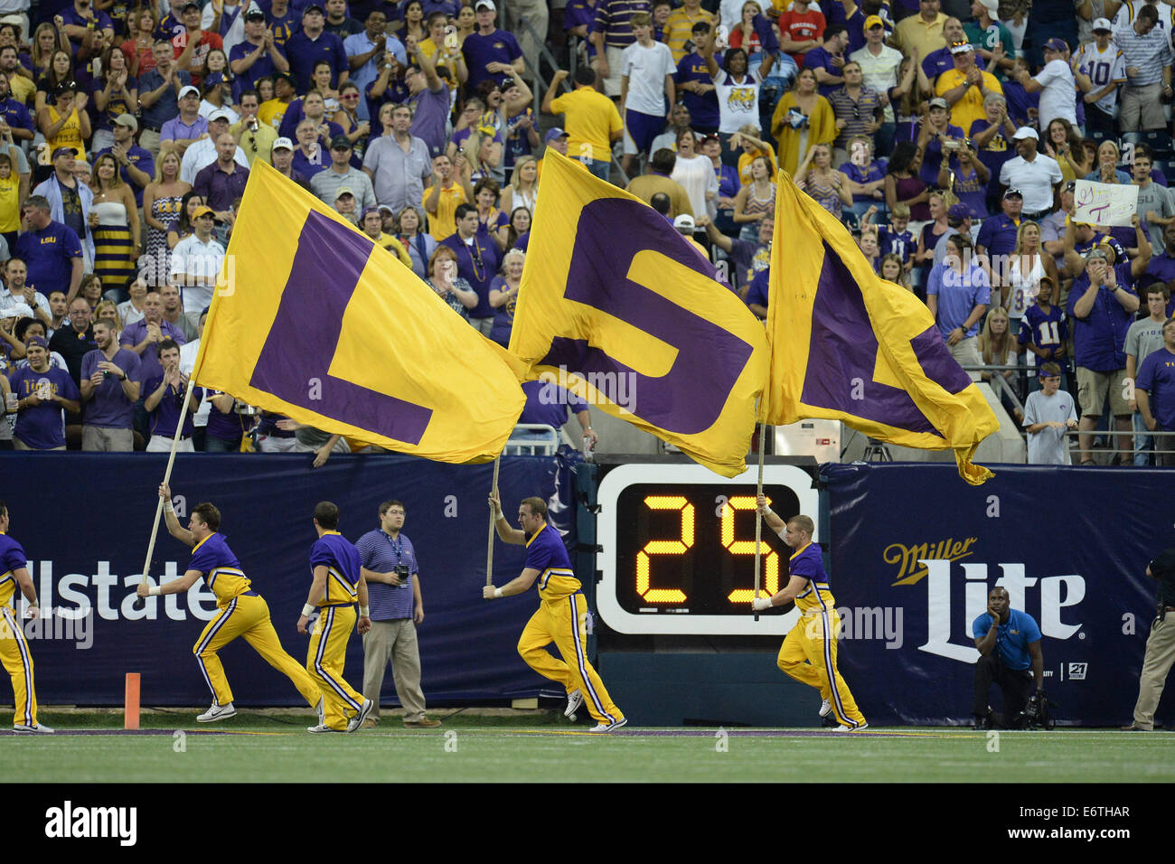 Houston, Texas, USA. 30th Aug, 2014. LSU Tigers flag bearers celebrate ...