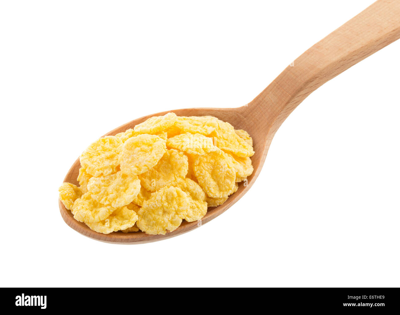 corn flakes in spoon isolated on white background Stock Photo - Alamy
