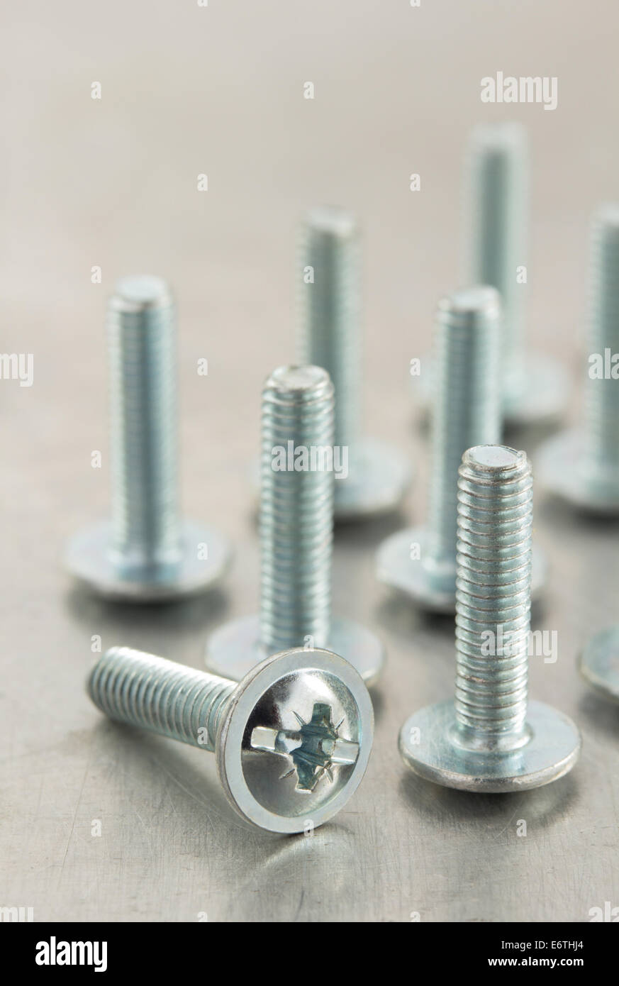 bolts tool at metal background texture Stock Photo - Alamy