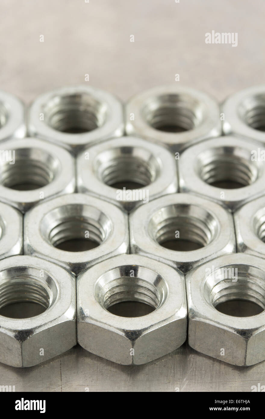 nuts tool at metal background texture Stock Photo - Alamy