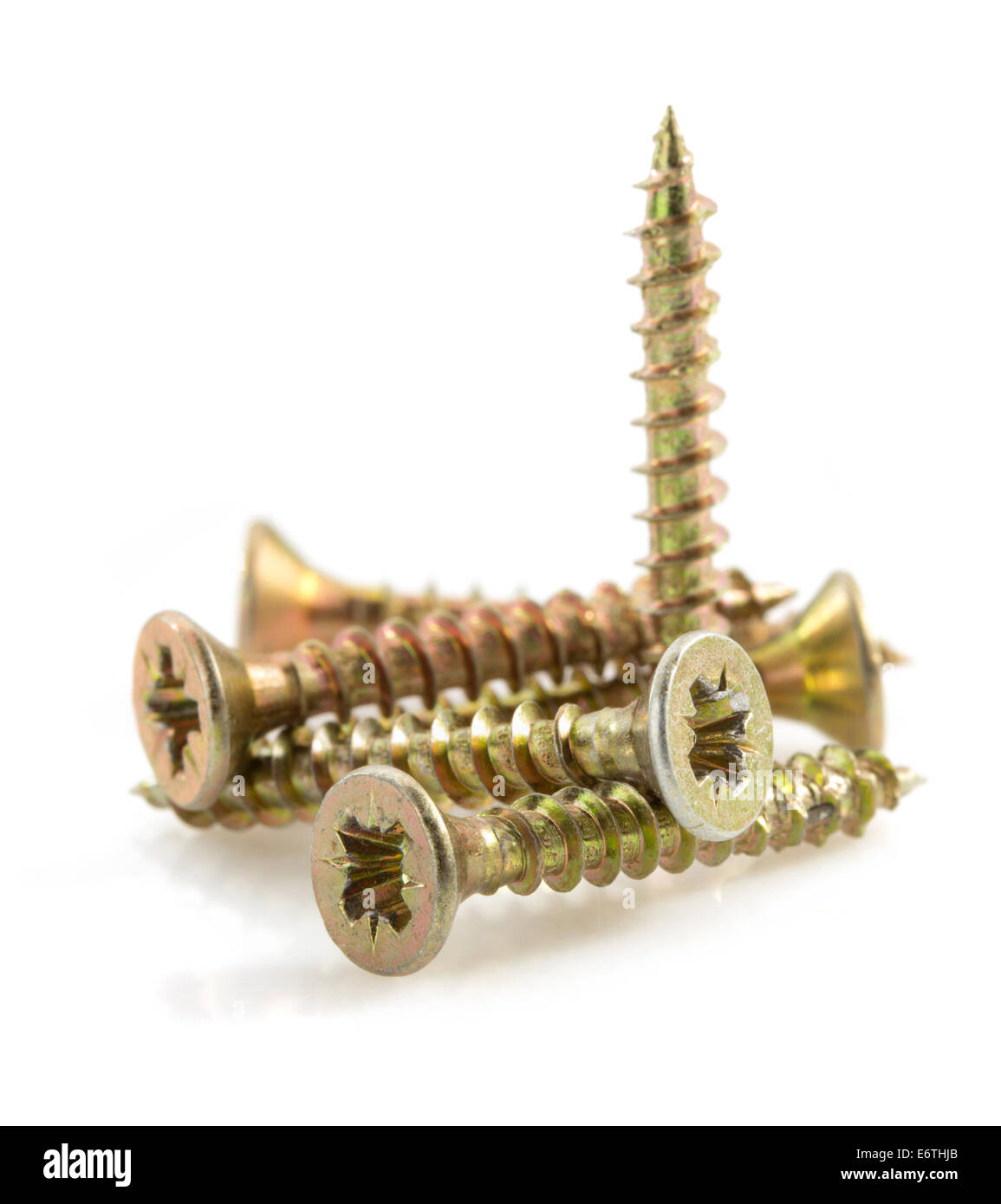 Yellow metal screws on Cut Out Stock Images & Pictures - Alamy