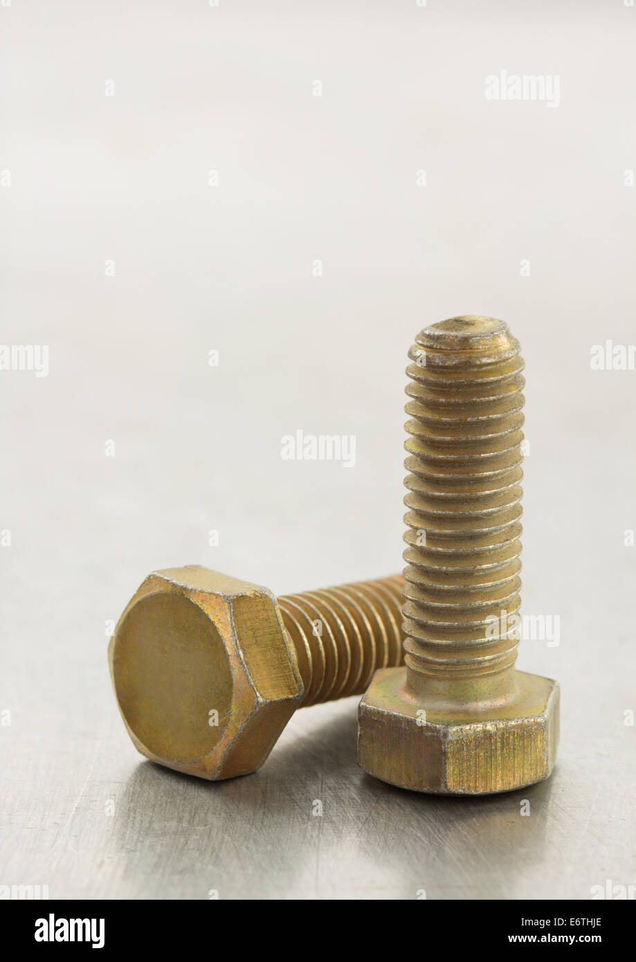 bolts tool at metal background texture Stock Photo - Alamy