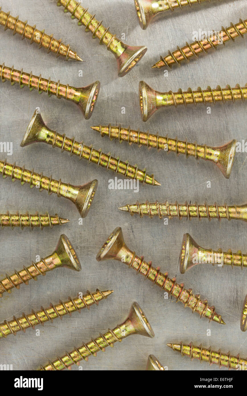 screws tool at metal background texture Stock Photo - Alamy