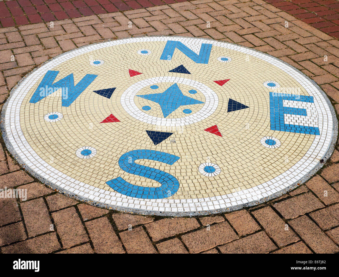Mosaic compass in Rhyl Wales UK Stock Photo - Alamy