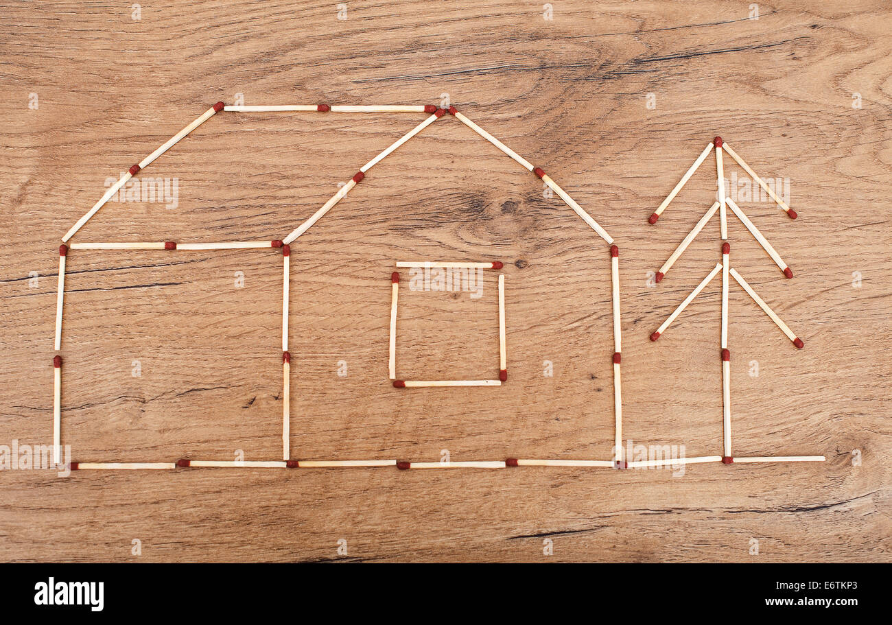 House made from matches on wooden tabletop Stock Photo - Alamy