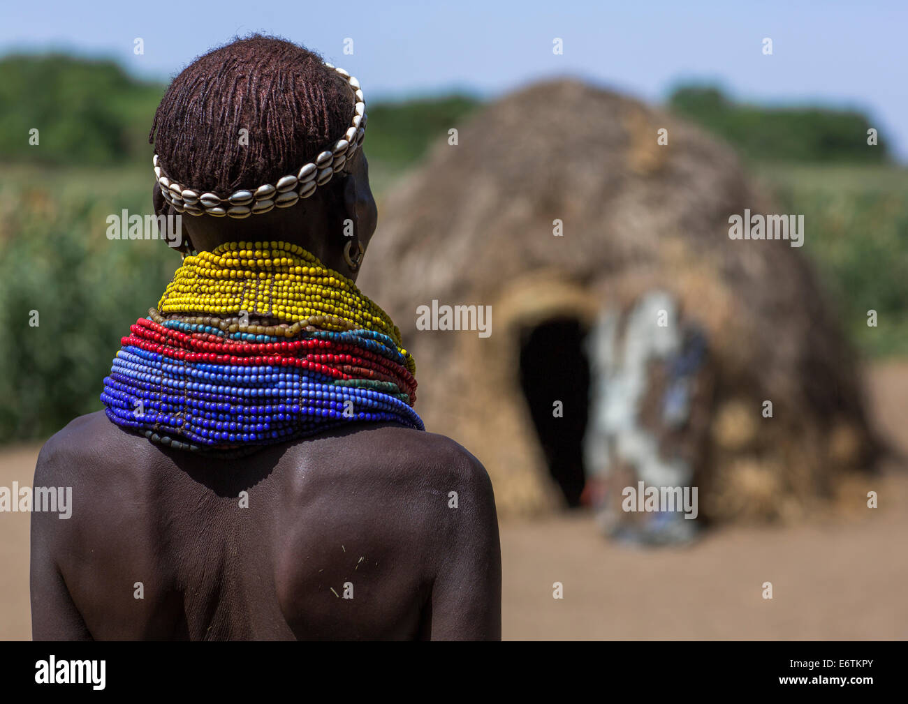Portrait Of A Nyangatom Tribe Woman With Huge And Colourful Necklaces ...