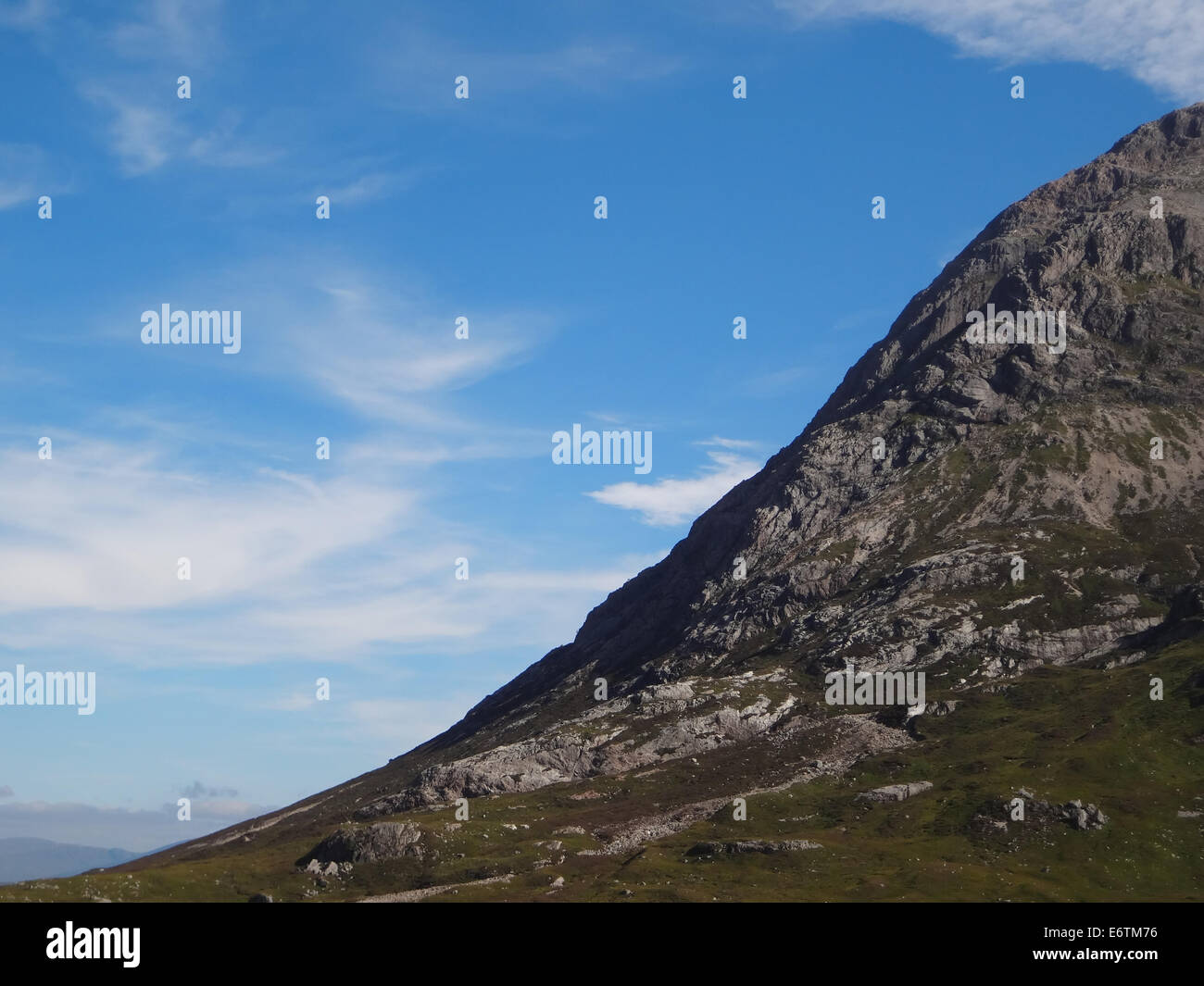 Scottish Highlands, mountain valley with blue sky Stock Photo - Alamy