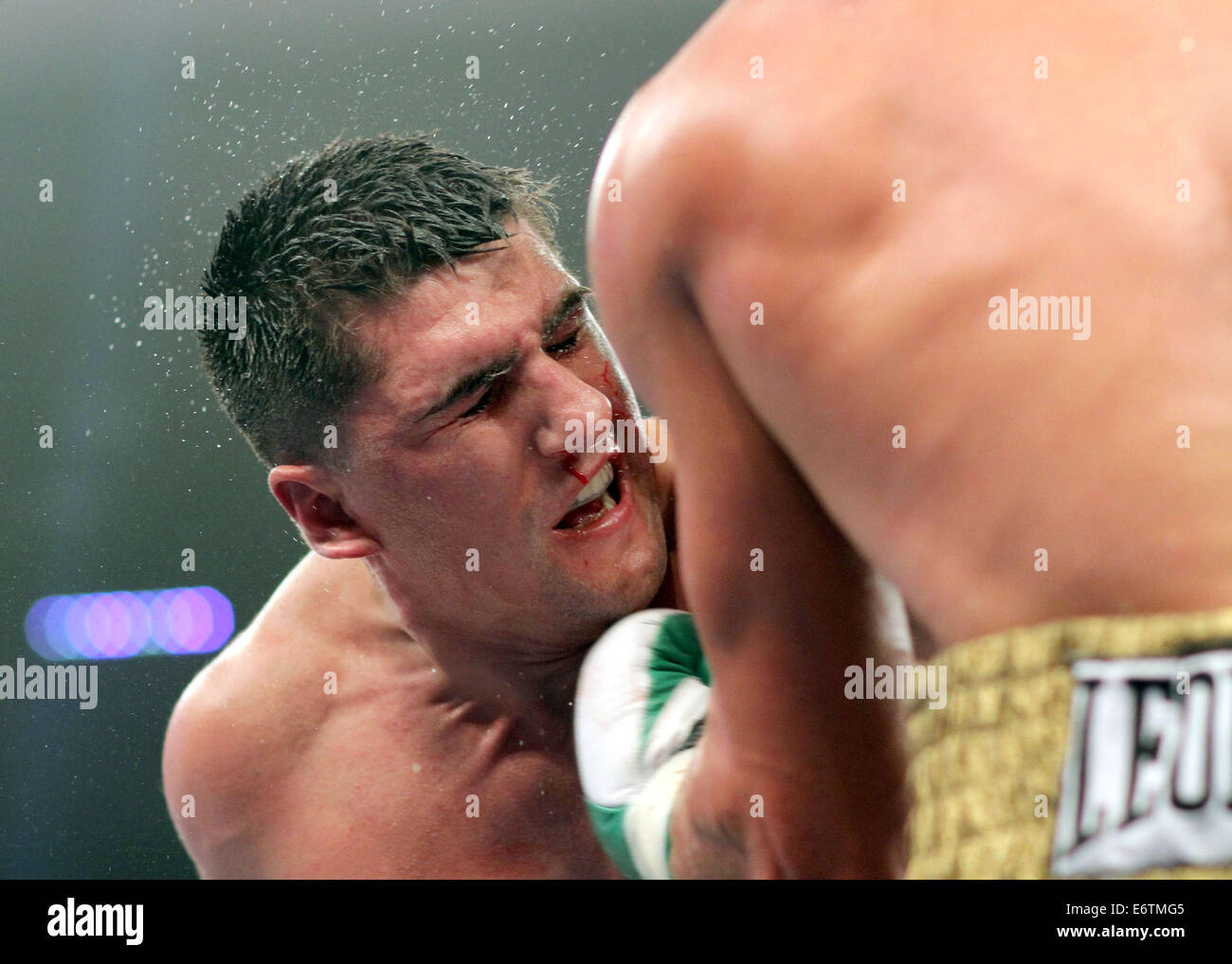 Germany's Marco Huck (L) and Italy's Mirko Larghetti fight for the WBO ...