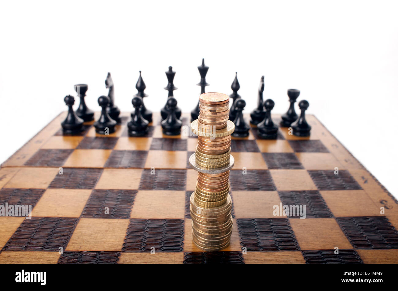 Coins on a chess board hi-res stock photography and images - Alamy