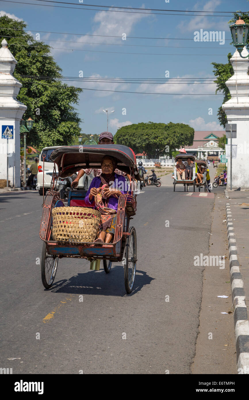 Yogyakarta, Java, Indonesia. Passengers in Becak, Three-wheeled ...