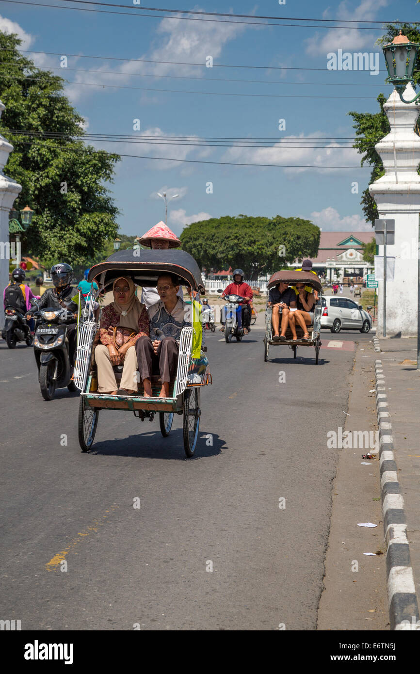 Yogyakarta, Java, Indonesia. Passengers in Becak, Three-wheeled ...