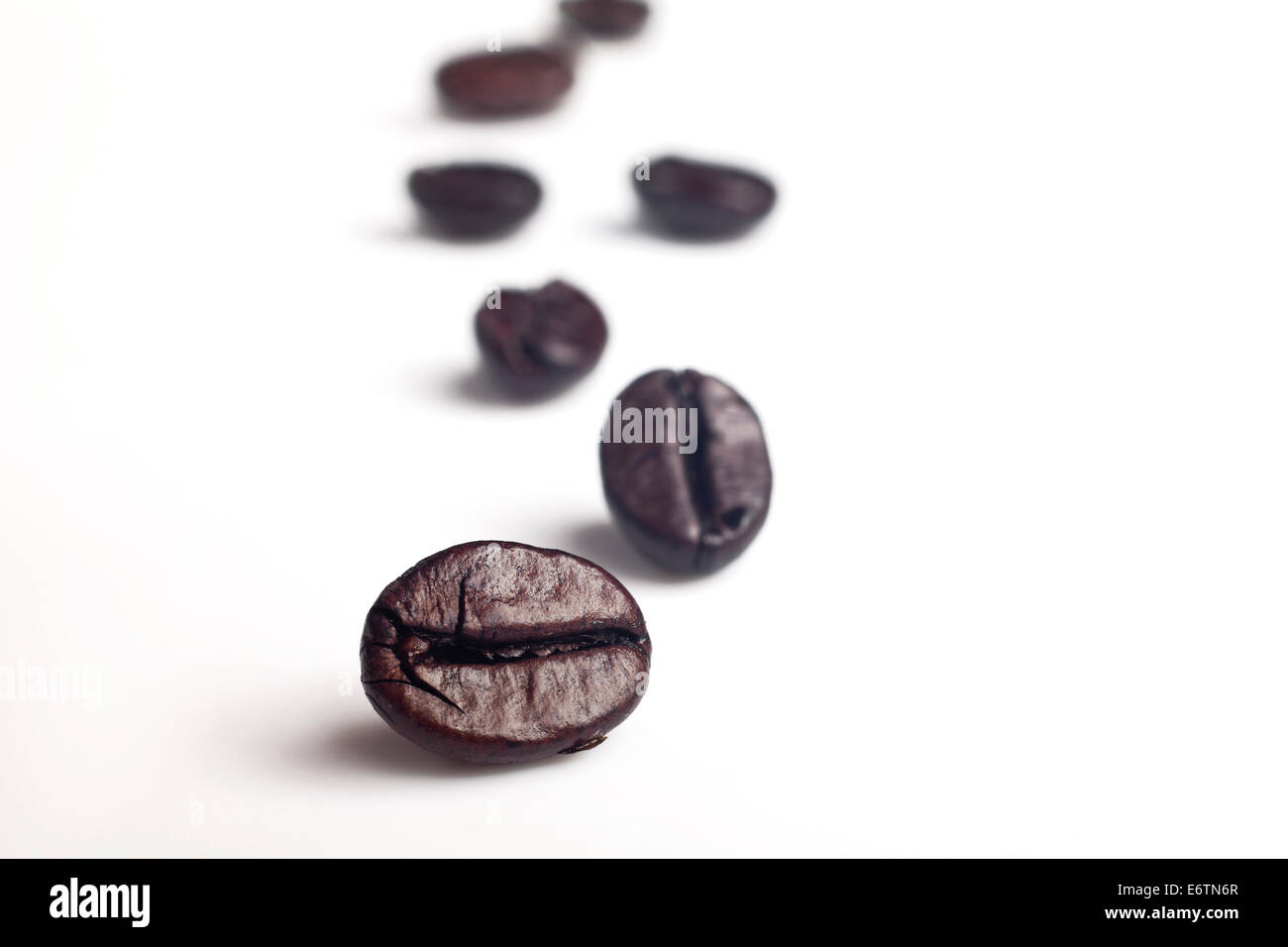 Coffee beans background. Macro. The focus is on the first bean Stock ...