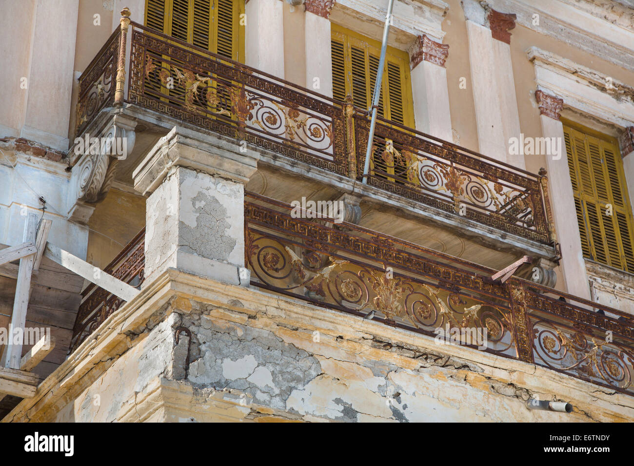 Old broken balcony on a old house with rust and broken wall Stock Photo ...
