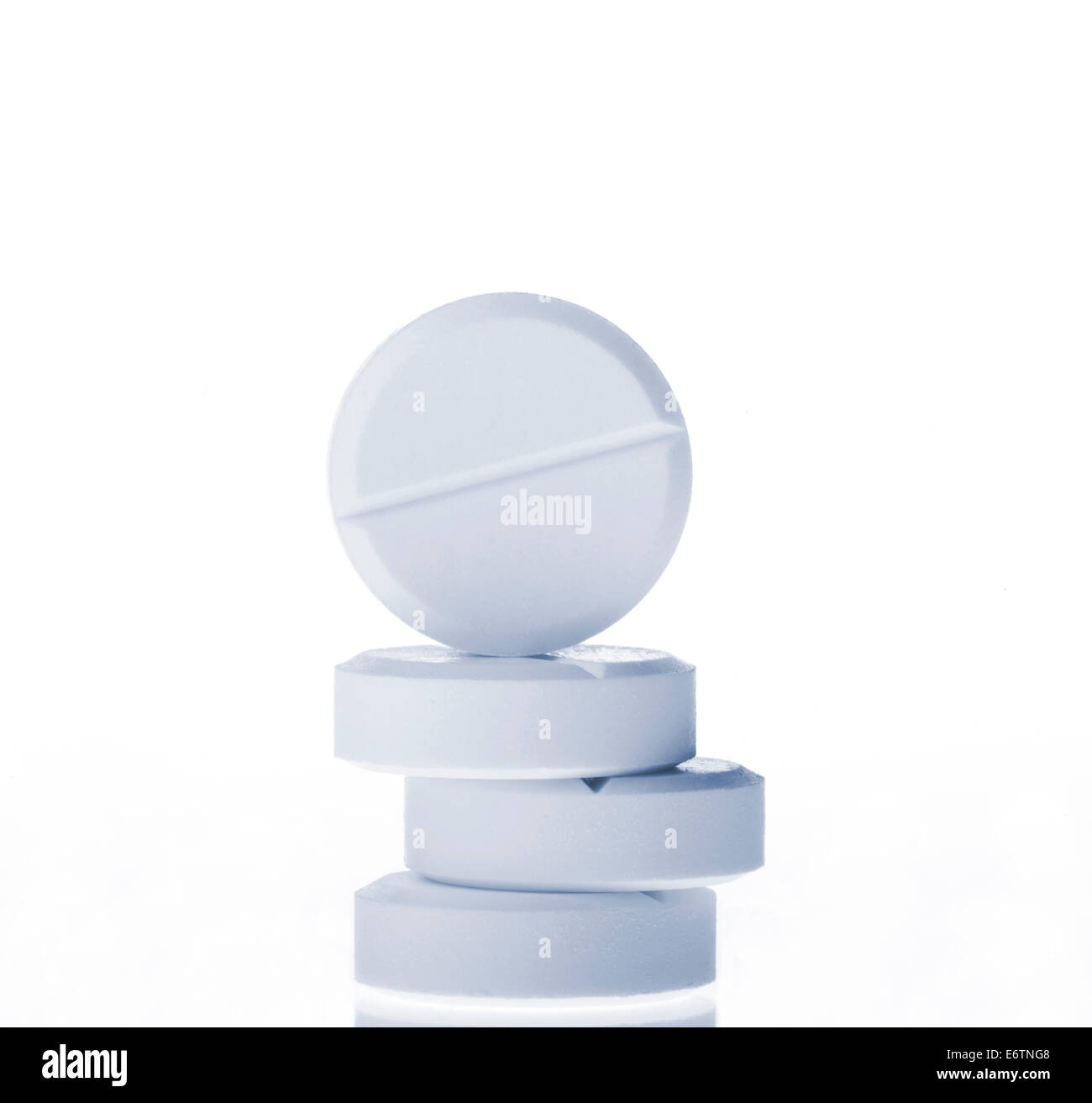 Pharmacy theme. Heap of white round medicine tablet pills. Tinted in ...